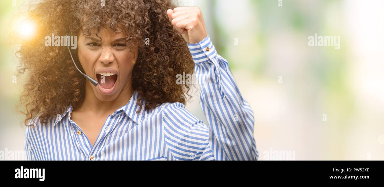 African american call center operator woman annoyed and frustrated ...