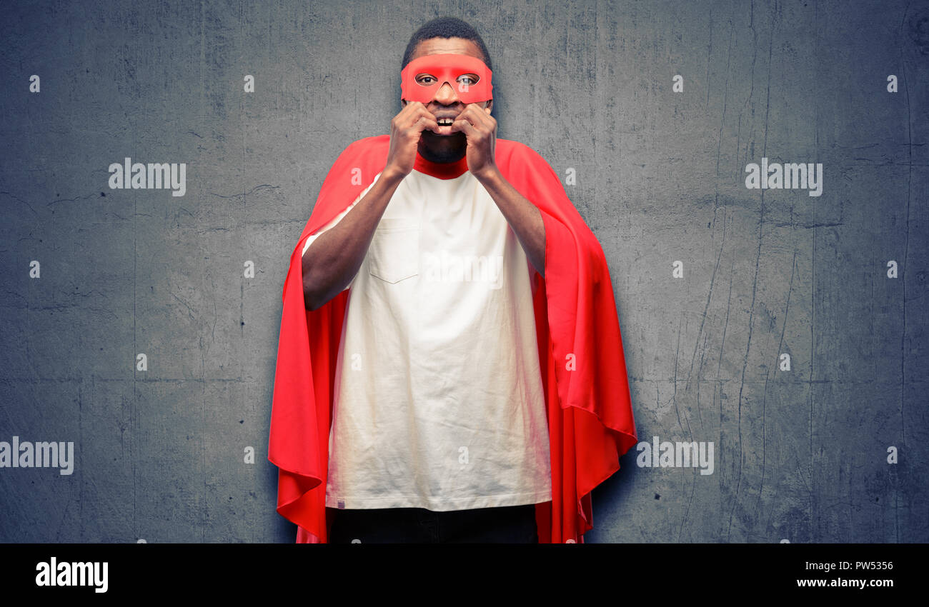 African black super hero man terrified and nervous expressing anxiety ...