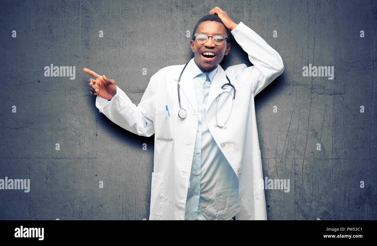Laughing black boy doctor hi-res stock photography and images - Alamy