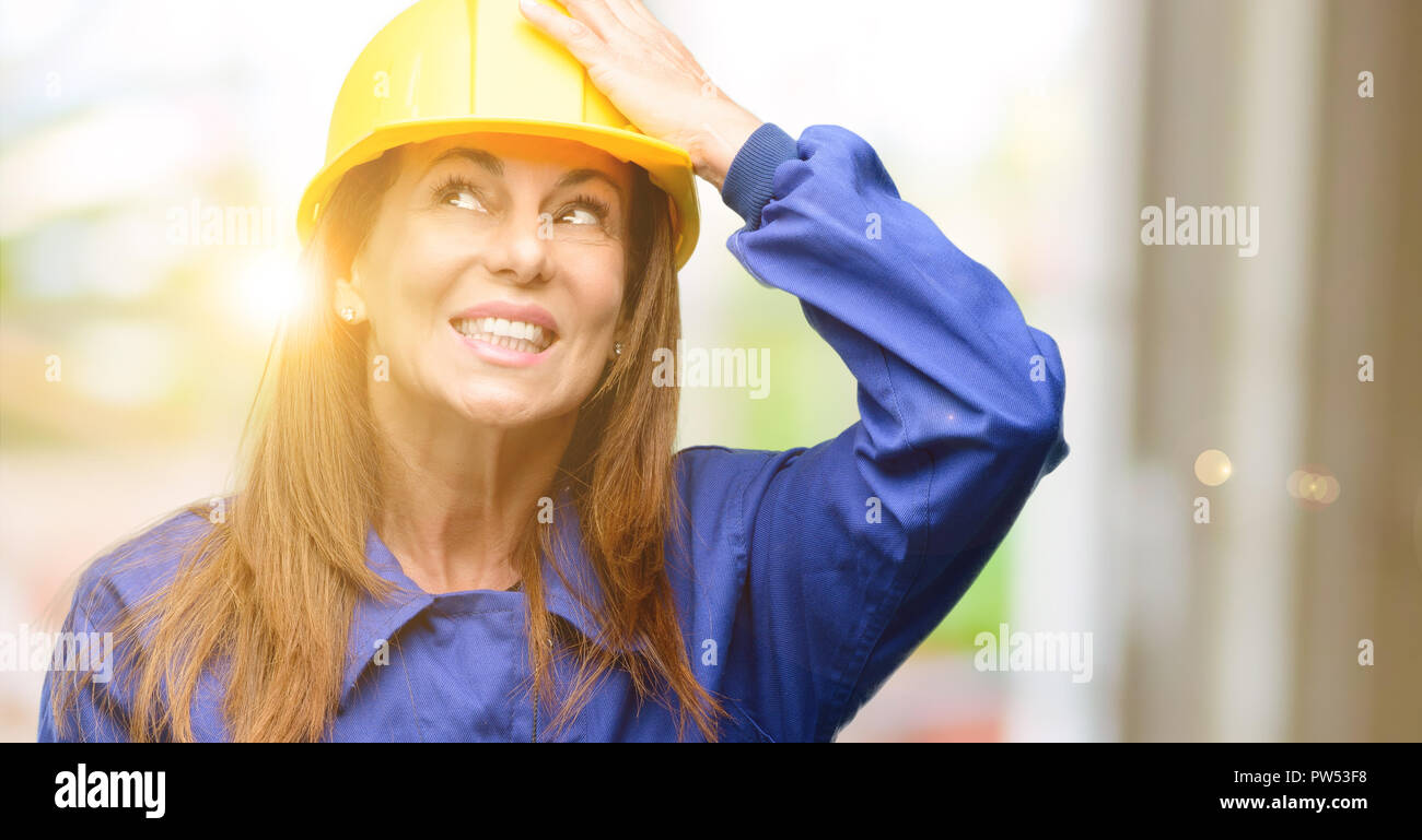 Engineer construction worker woman terrified and nervous expressing ...