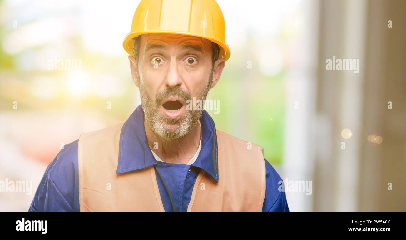 Senior engineer man, construction worker scared in shock, expressing ...