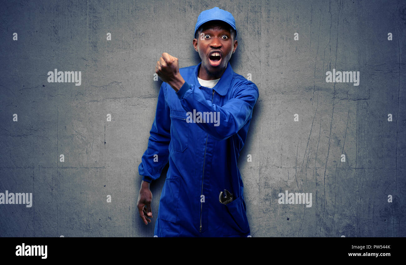 African black plumber man irritated and angry expressing negative ...