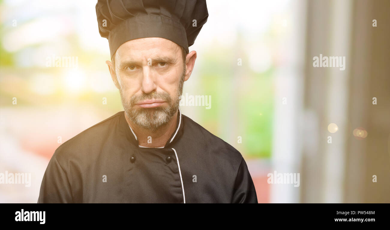 Senior handsome baker man hi-res stock photography and images - Alamy