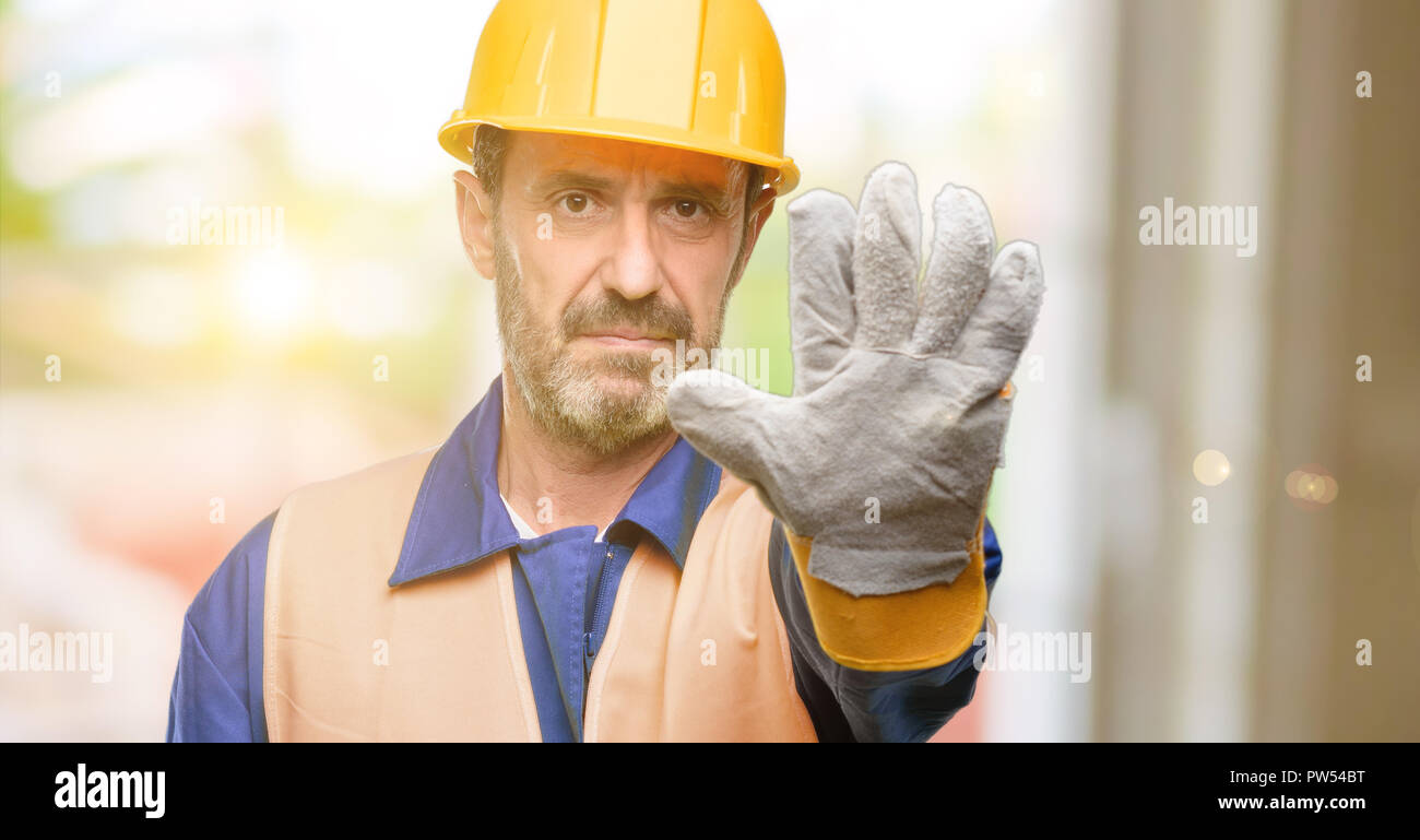 Senior engineer man, construction worker annoyed with bad attitude ...