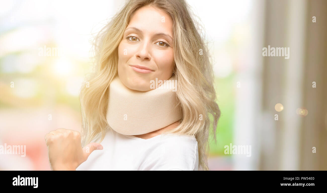 Young injured woman wearing neck brace proud, excited and arrogant ...