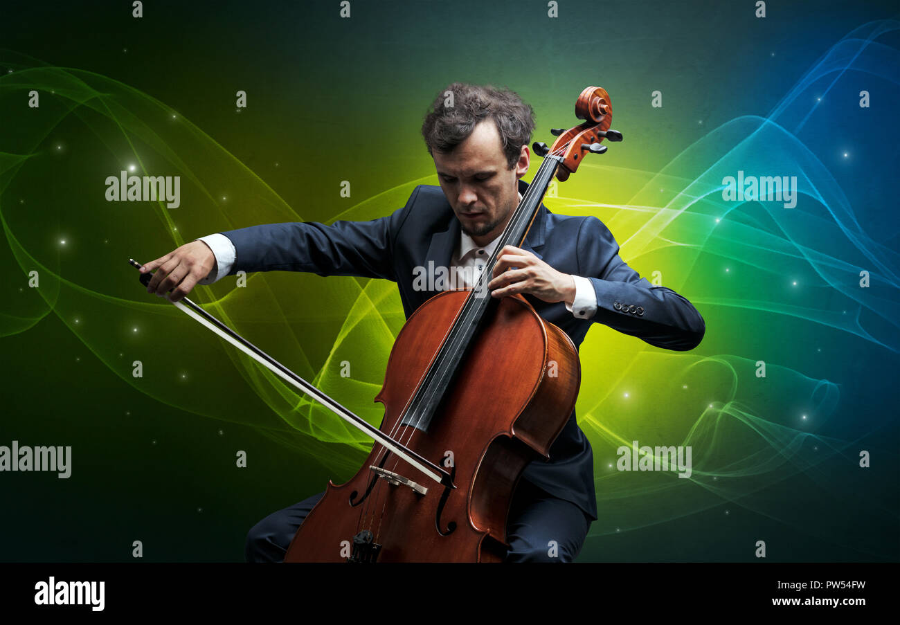 Serious classical cellist with fabled sparkling wallpaper Stock Photo ...