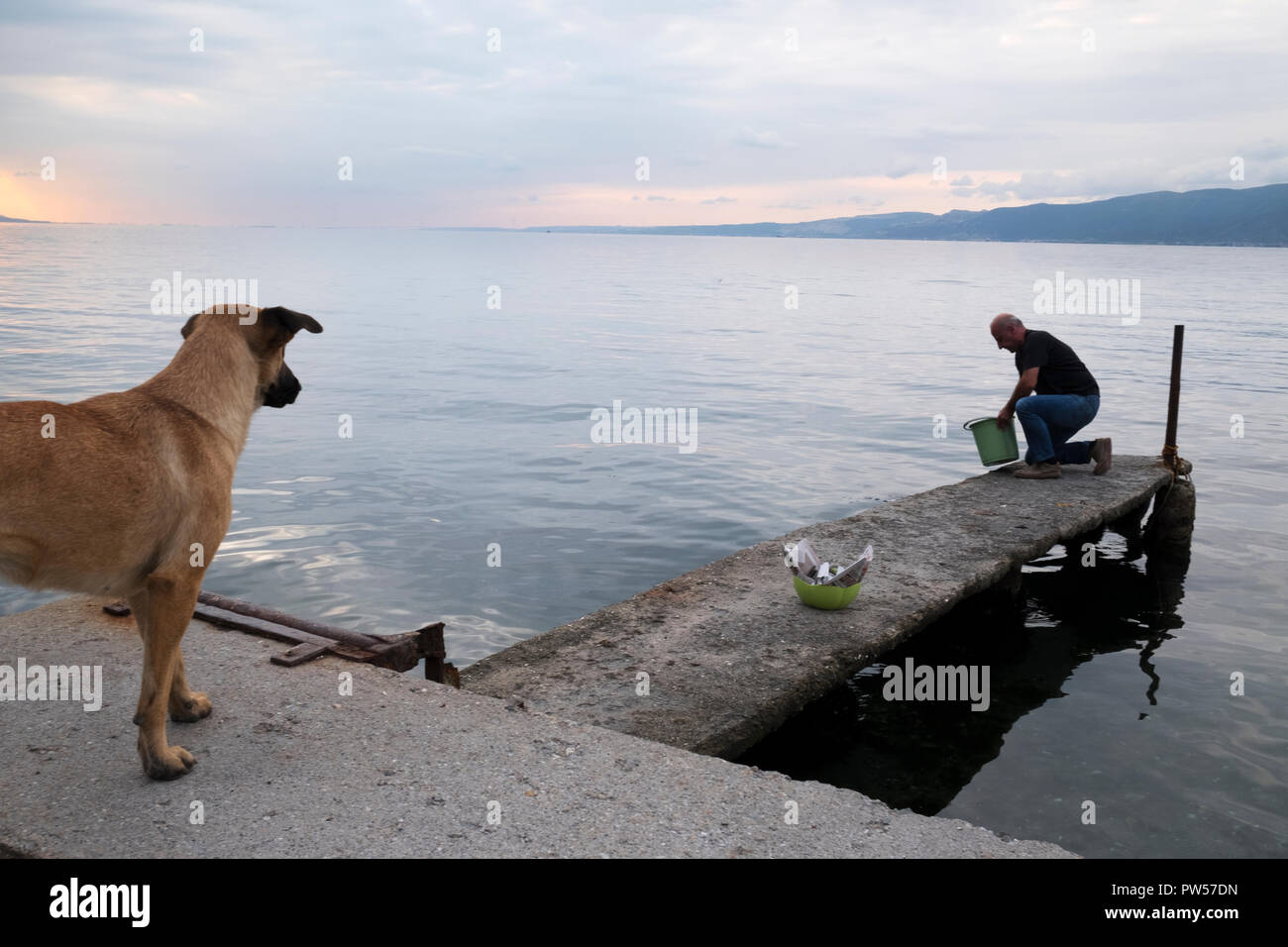 Fisherman with a dog hi-res stock photography and images - Alamy