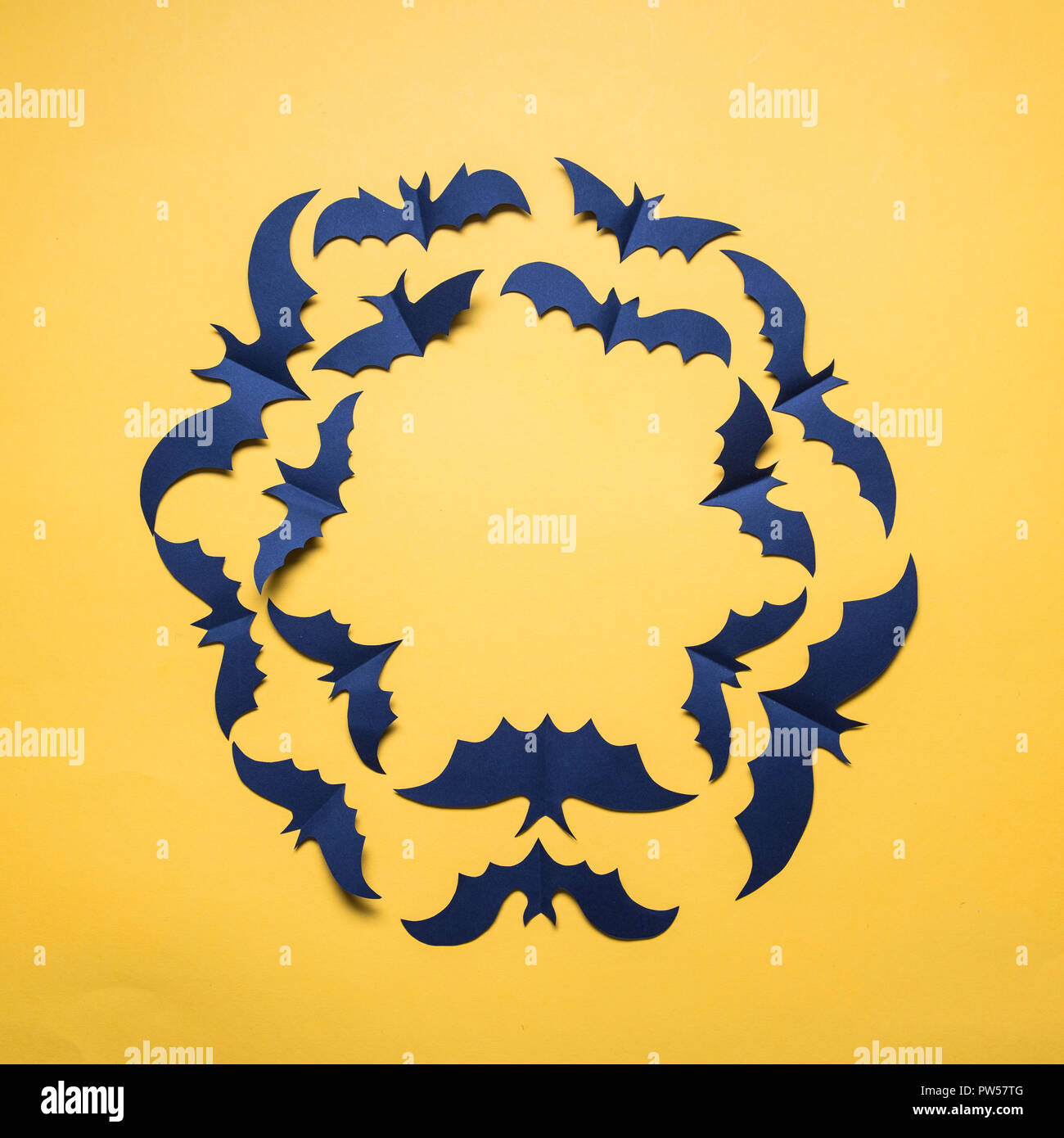 Halloween paper vampire bat decorations on an orange background Stock ...