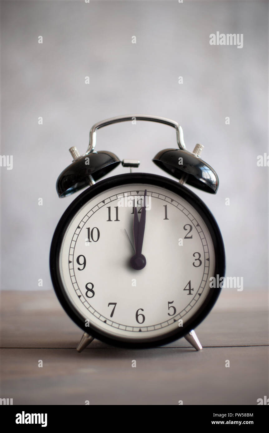 Old fashioned alarm clock close up Stock Photo - Alamy