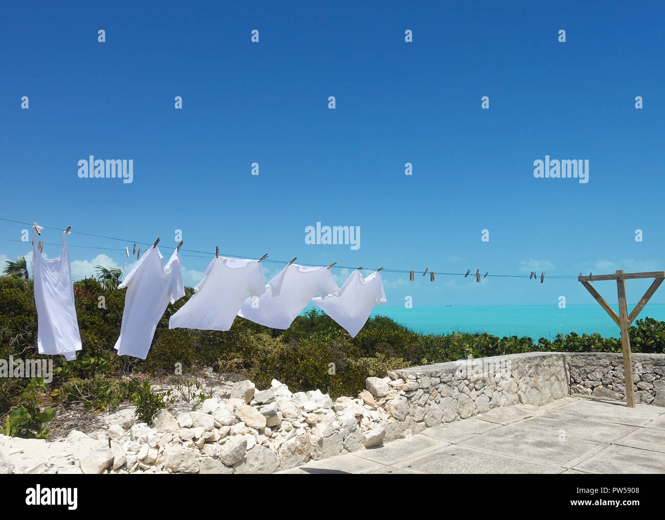 Clothes drying in the wind on a clothes line hi-res stock photography ...