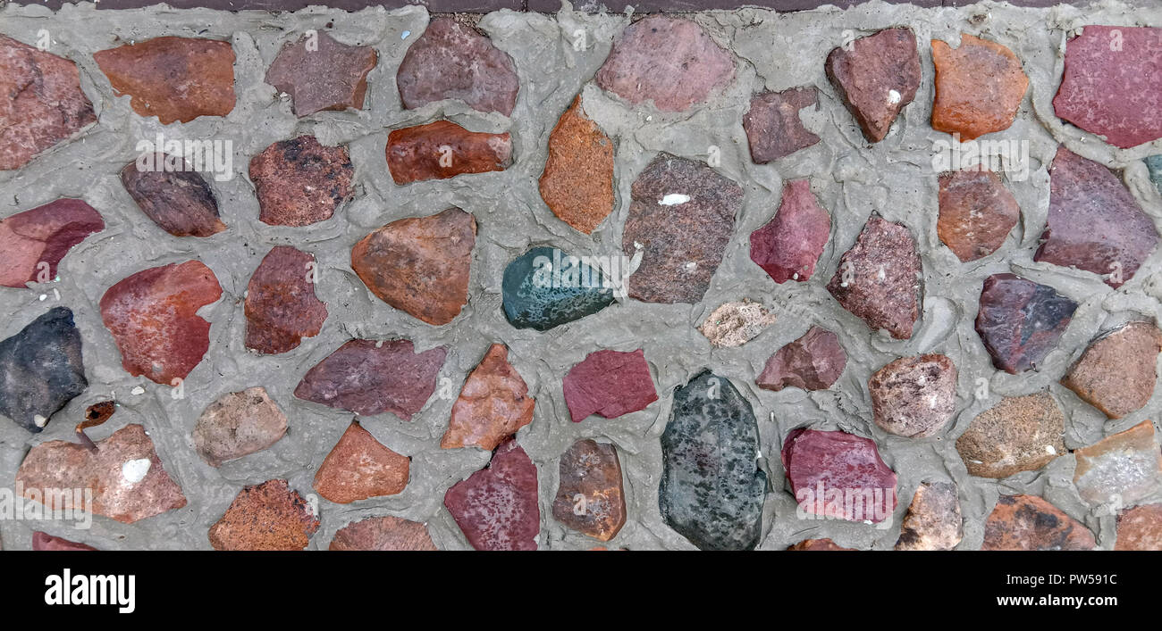 The texture of natural stone and granite. Close-up. Cobblestone ...
