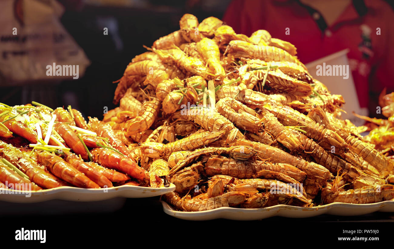 It’s one one of the vendor in local street food. Hubuxiang snack street ...