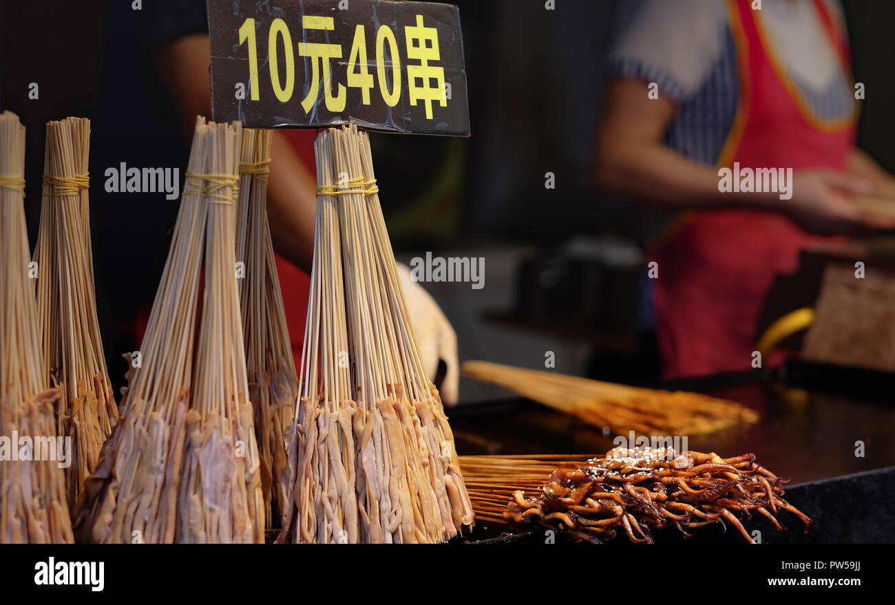 It’s one one of the vendor in local street food. Hubuxiang snack street ...