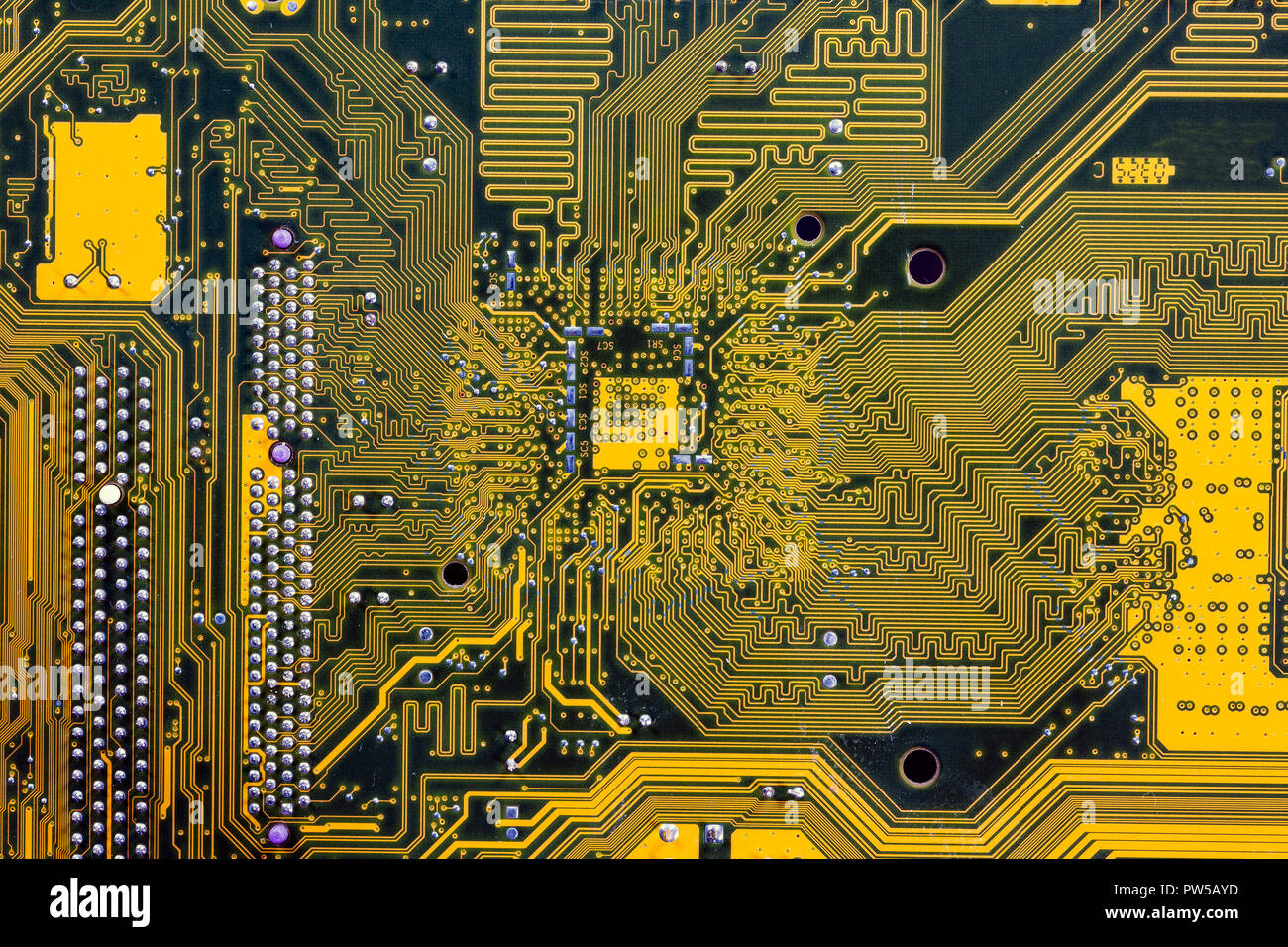 Green and yellow printed circuit board PCB. Computational equipment ...