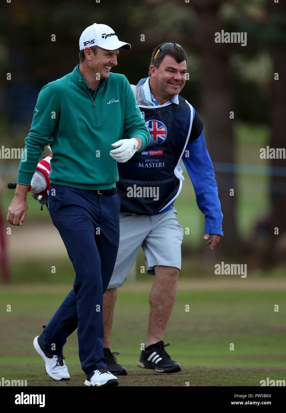 Justin Rose with his caddie during day two of the British Masters at ...