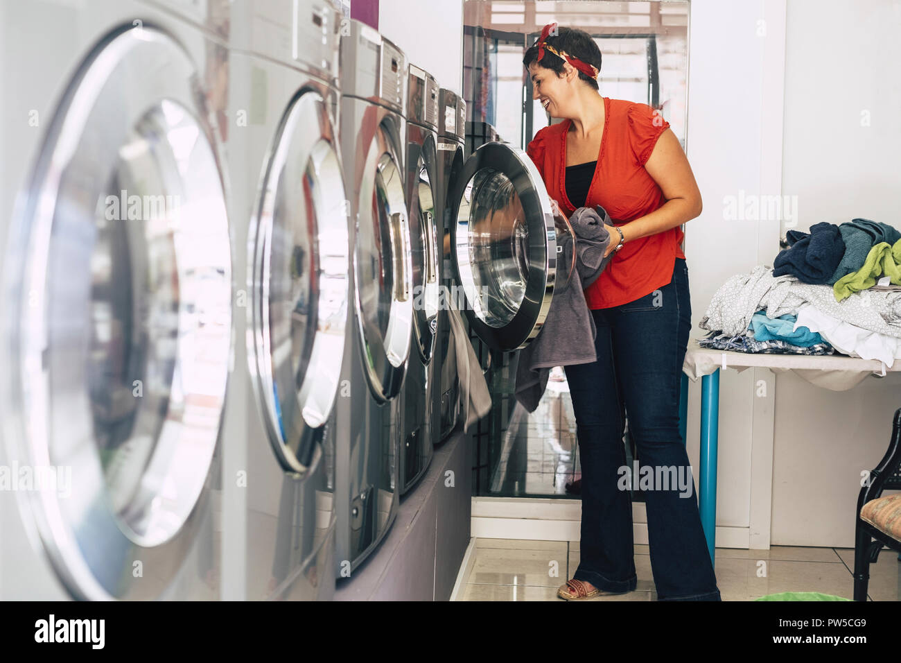 nice young brunette wash and clean some dresses and clothes at the ...