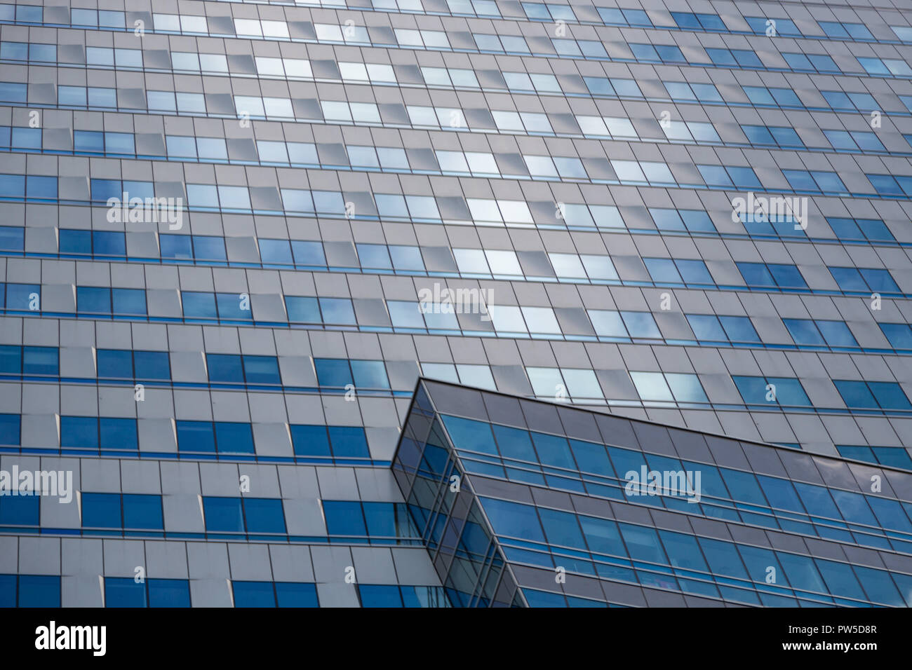 Wide angle abstract background view of steel light blue high rise ...