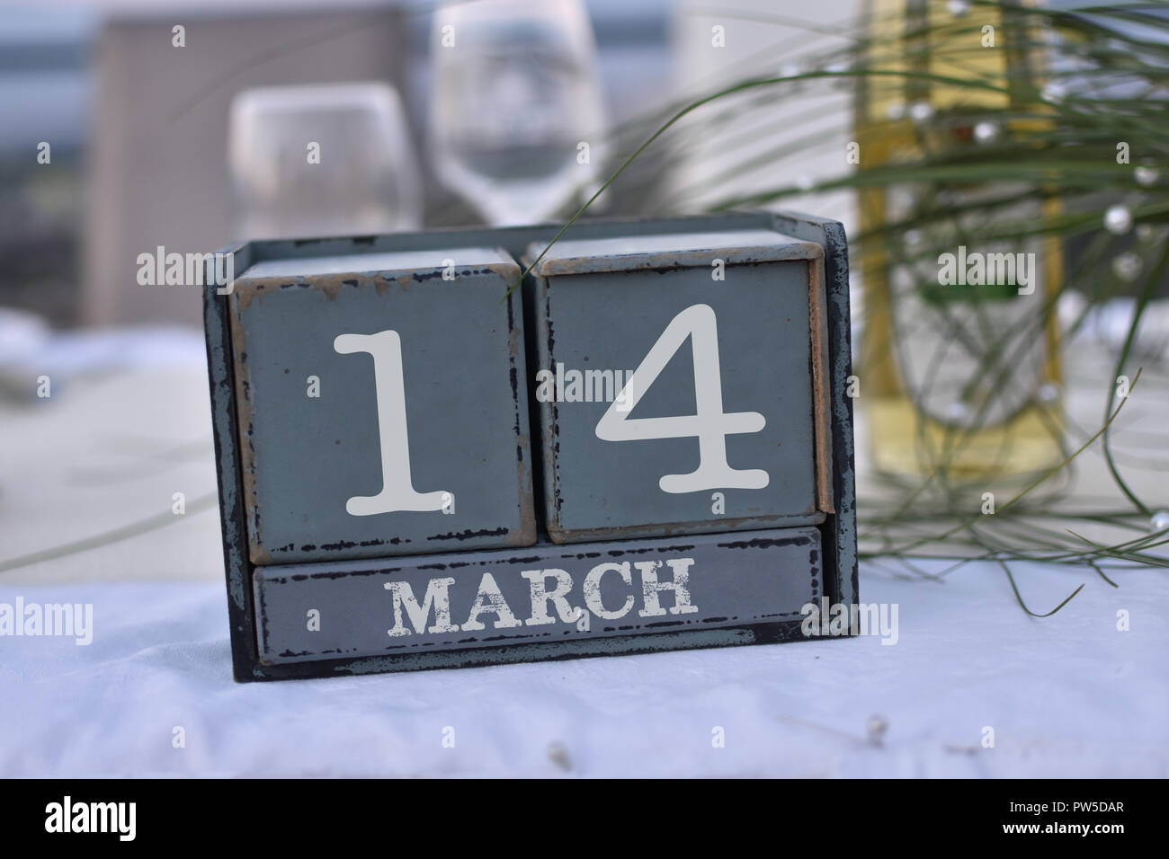 Wood blocks in box with date, day and month 14 March. Wooden blocks ...