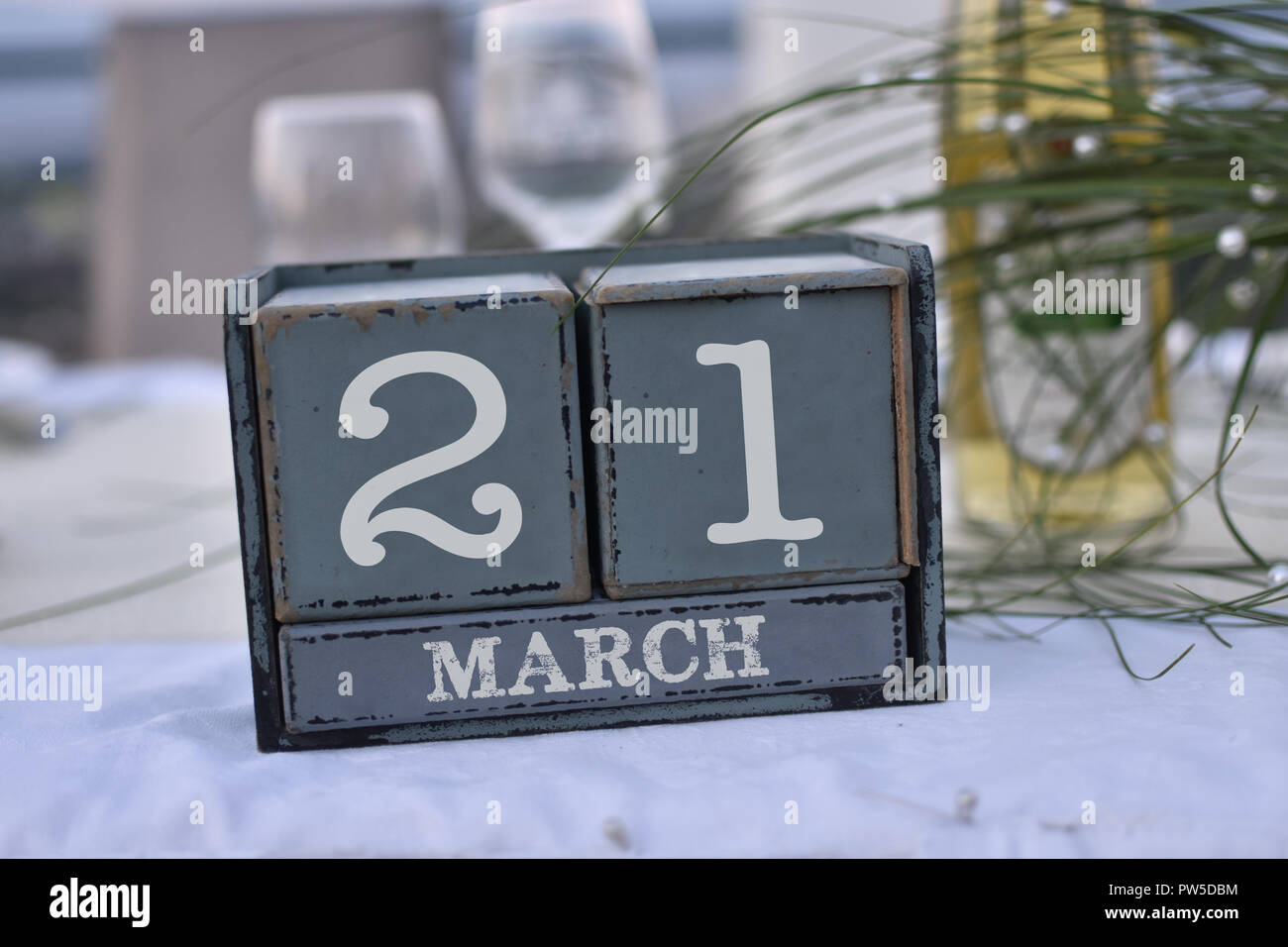 Wood blocks in box with date, day and month 21 March. Wooden blocks ...