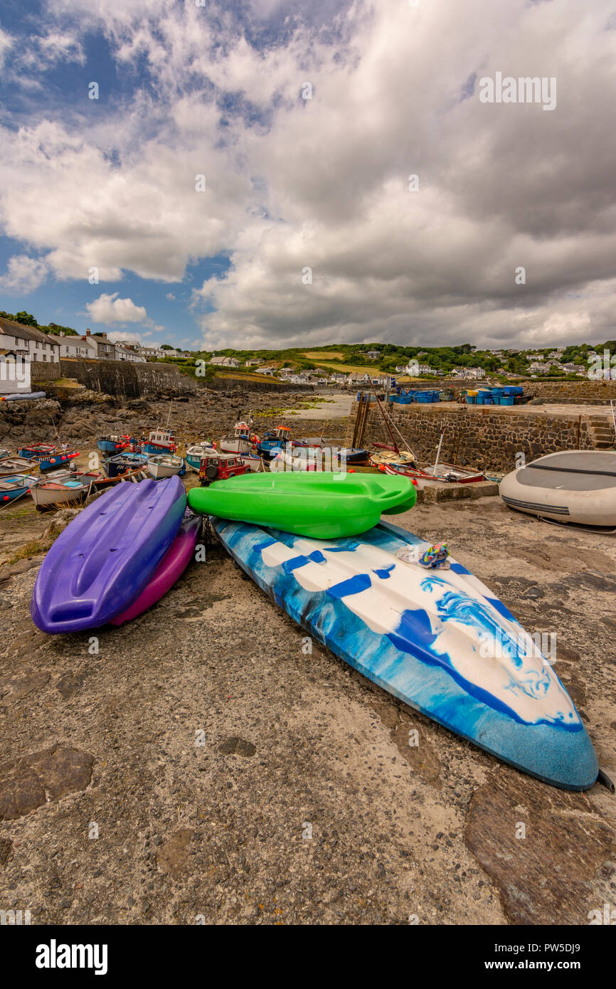 Surf / water boards - Coverack harbour, Cornwall, UK Stock Photo - Alamy