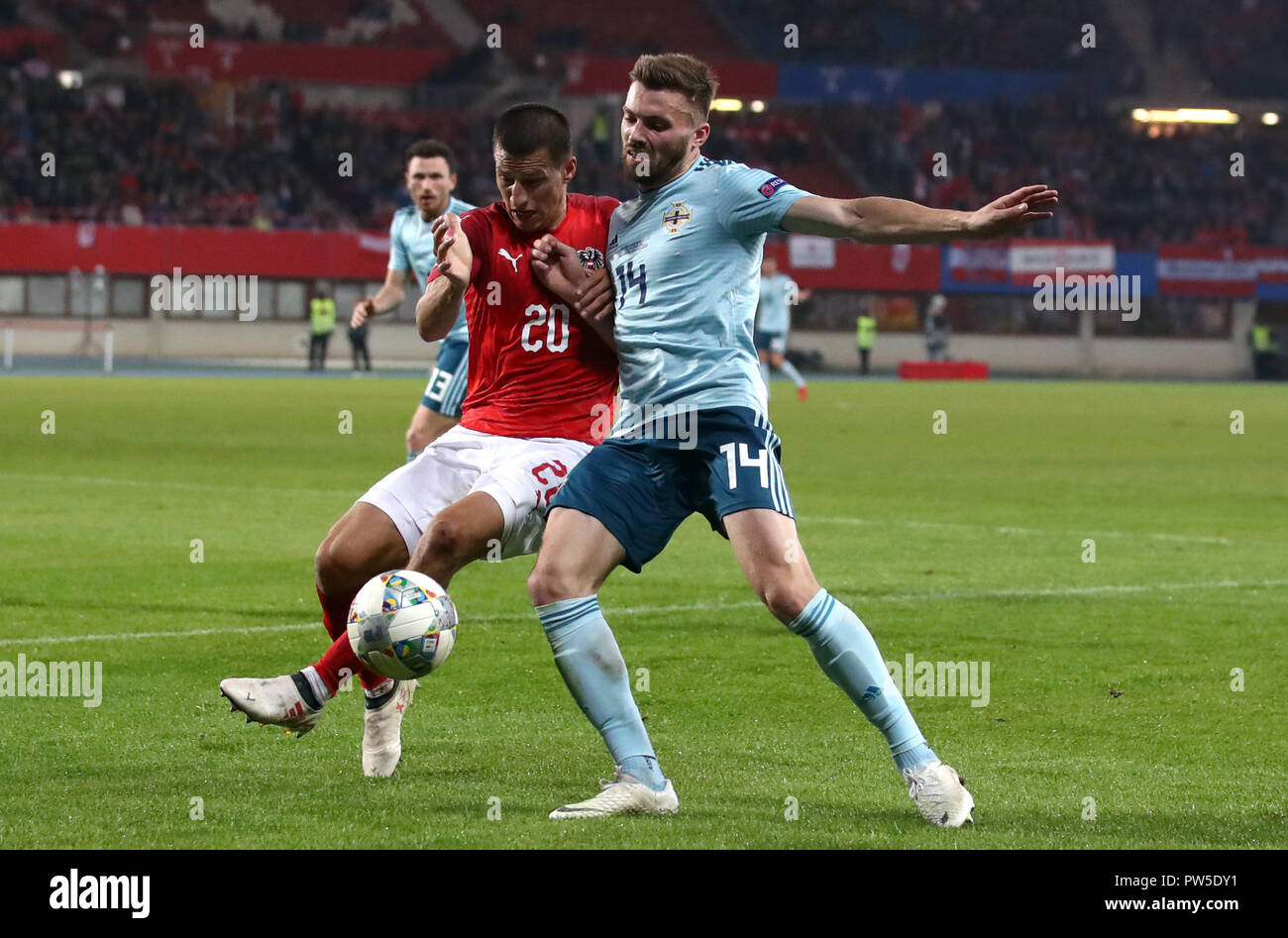 Austria's Stefan Lainer (left) and Northern Ireland's Stuart Dallas ...
