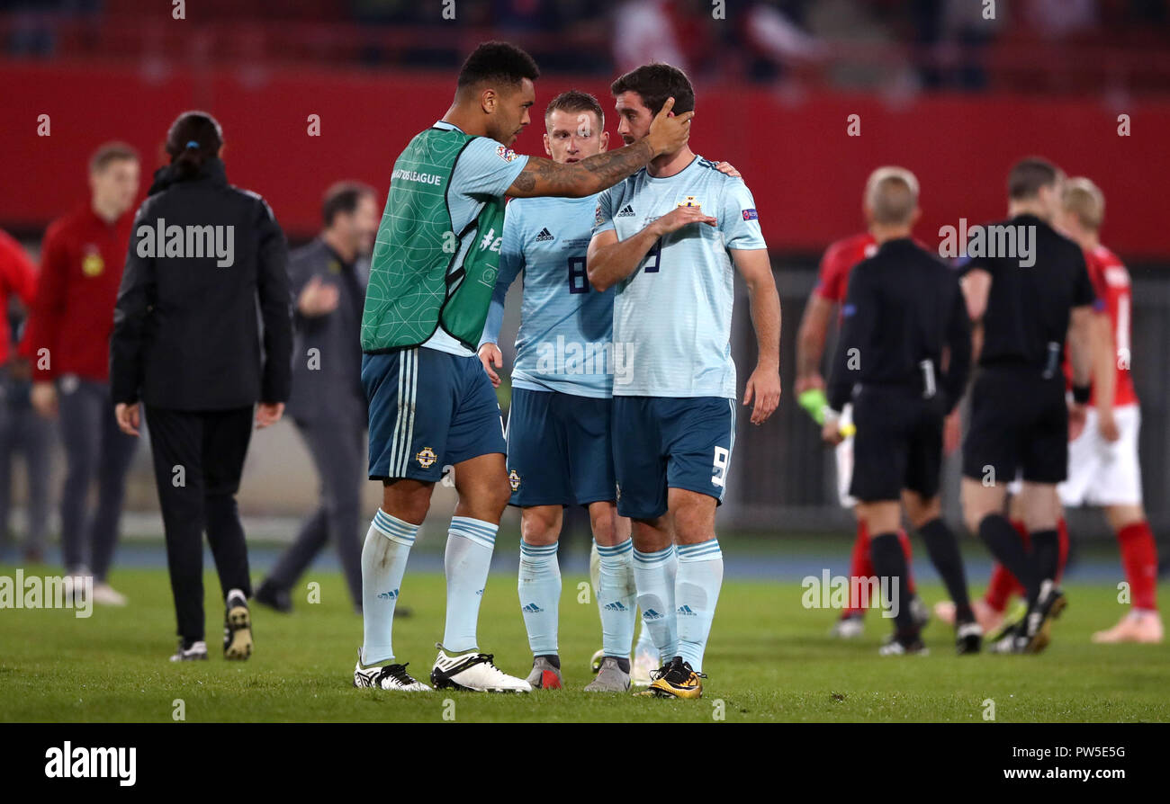 Northern Ireland's (from left to right) Josh Magennis, Steven Davis and ...