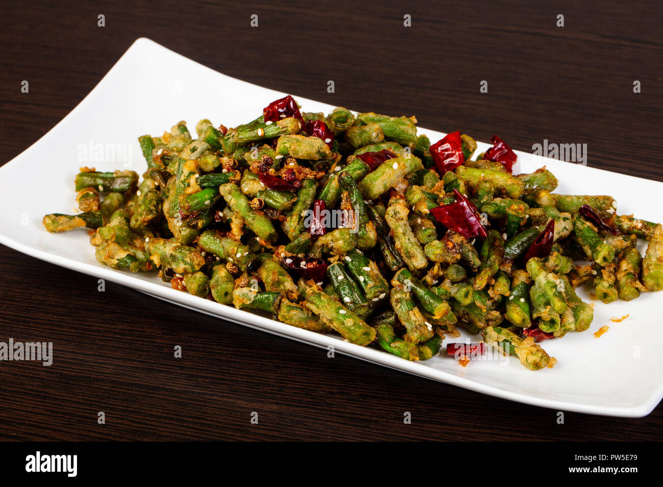 Chinese cuisine - Fried green bean Stock Photo - Alamy