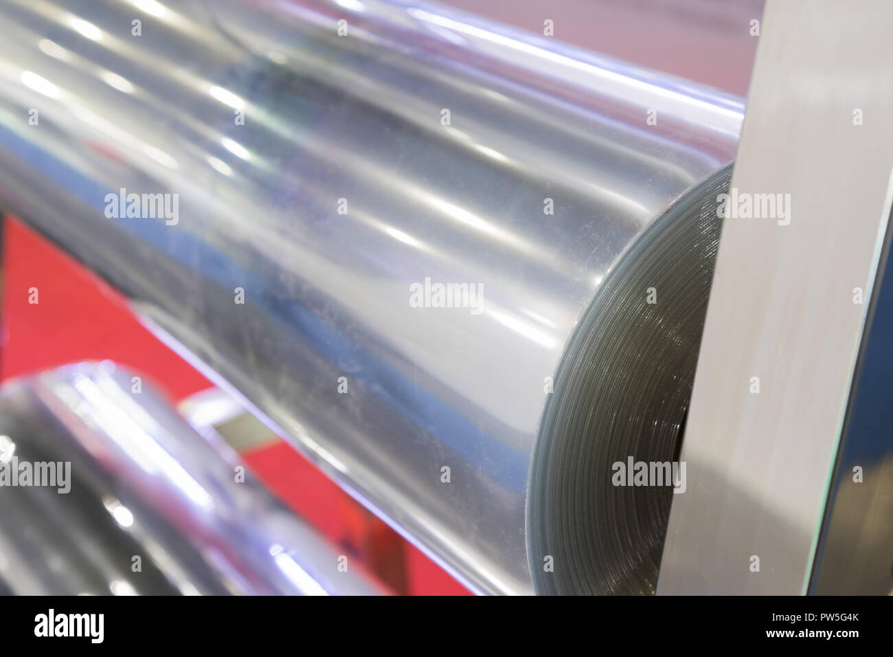 A roll of plastic sheet for manufacturing process Stock Photo - Alamy
