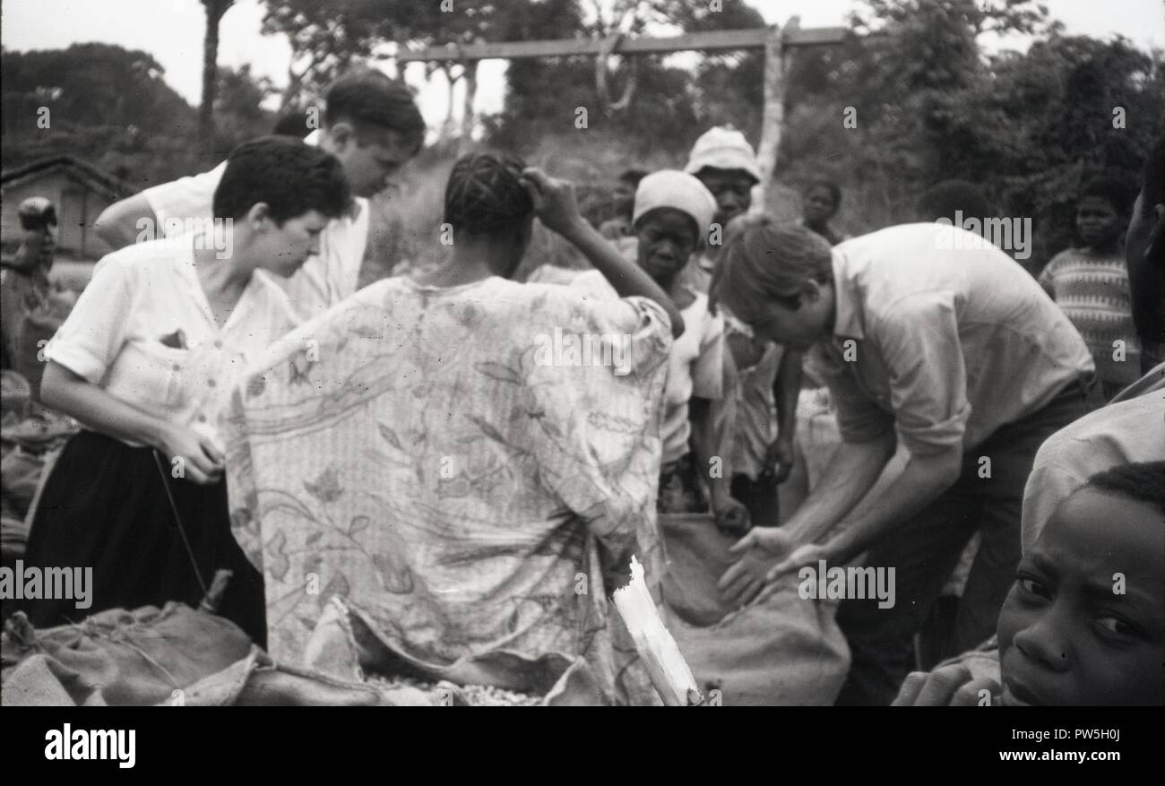 Snapshot of several people, gathered around one another Stock Photo - Alamy