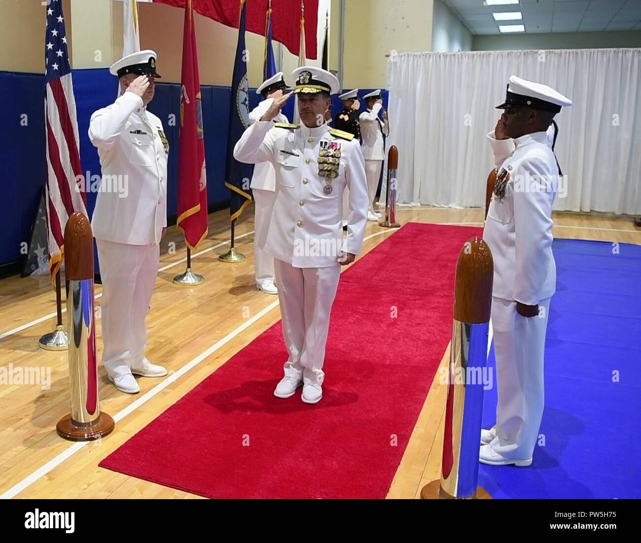 MANAMA, Bahrain (Sept. 19, 2017) Vice Adm. John Aquilino salutes side ...
