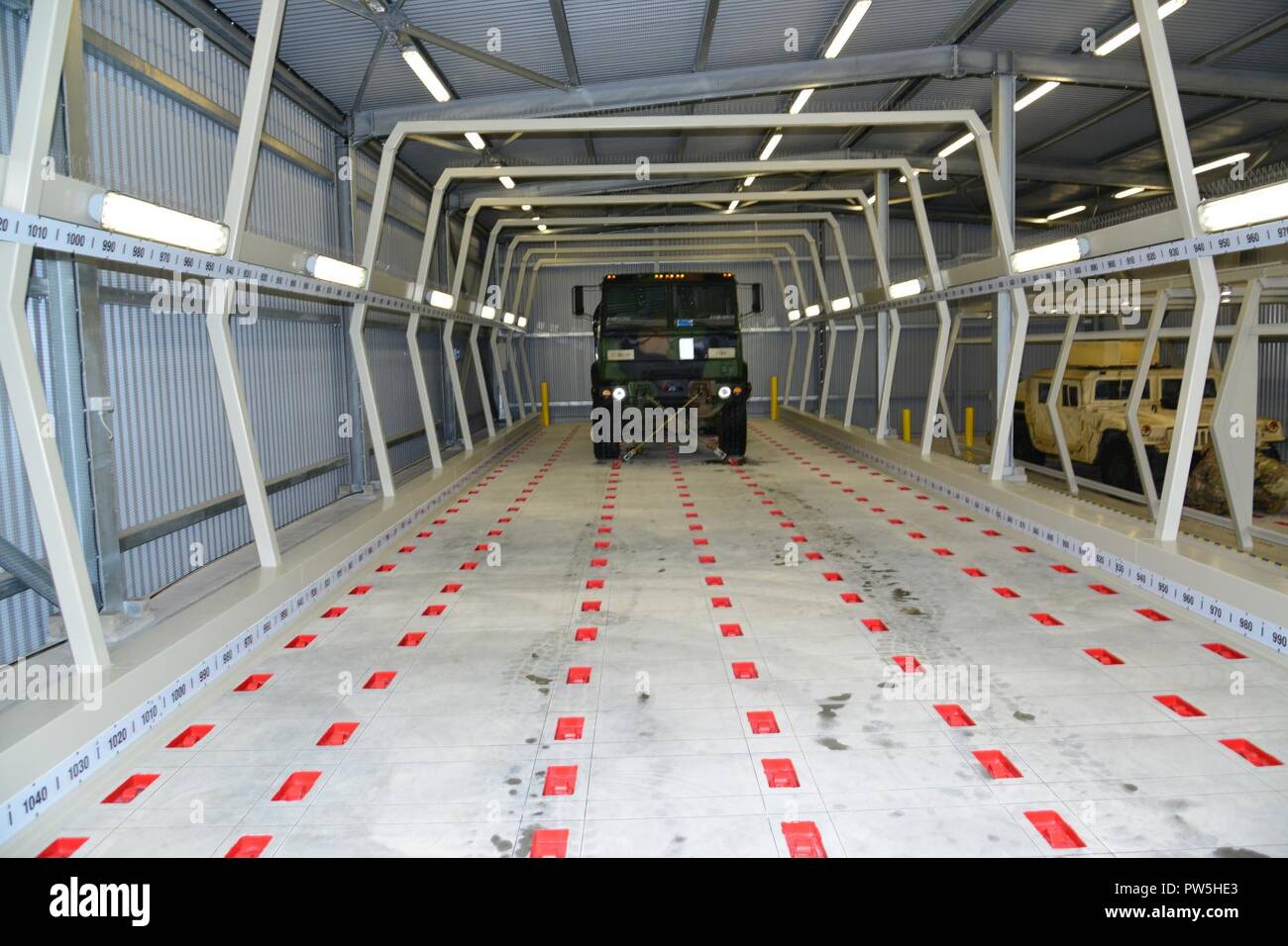 A M1078 LMTV light utility truck is loaded into a C-17 Aircraft Static ...