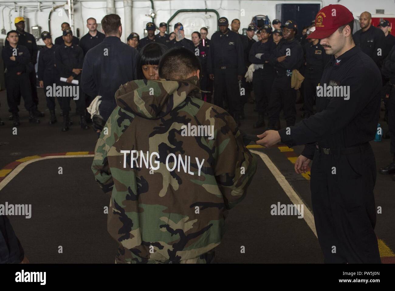 ATLANTIC OCEAN (Sept. 19, 2017) Sailors receive training on donning ...