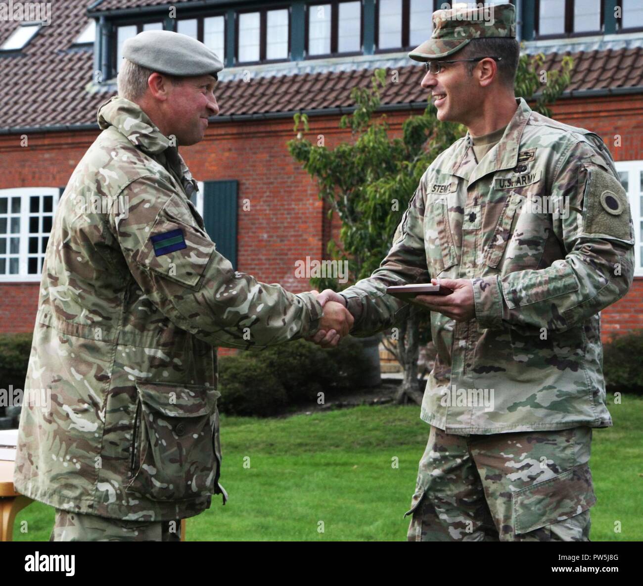 Lt. Col. Toby Gaddum of the Scottish and North Irish Yeomanry shakes ...