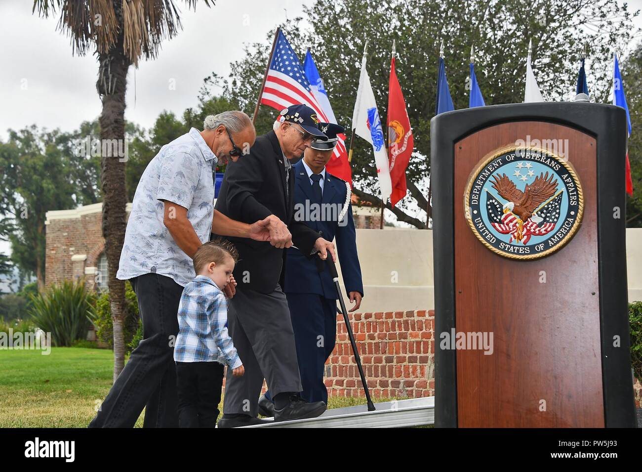 WWII veteran Samuel Schultz is assisted by family members and a UCLA ...