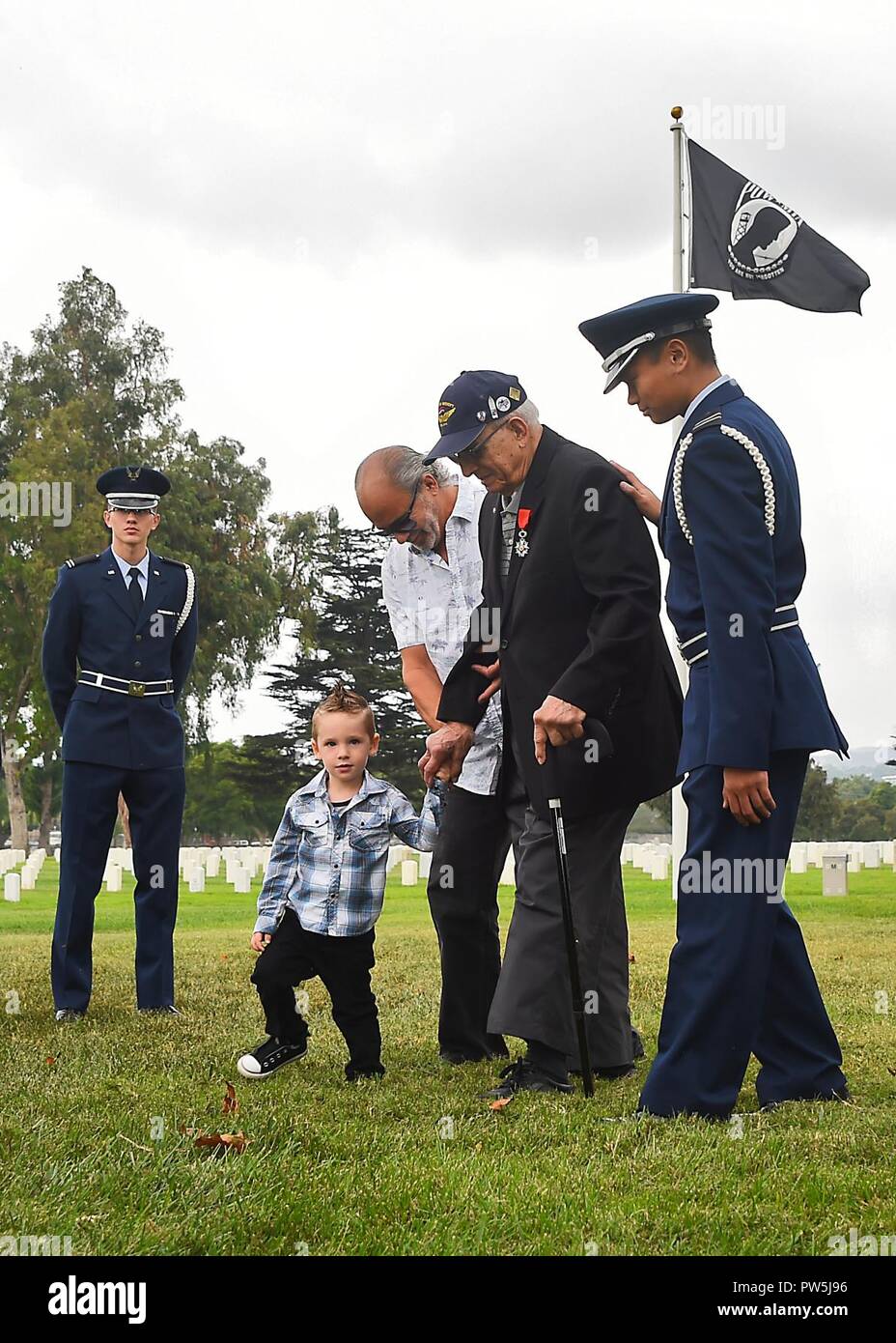 WWII veteran Samuel Schultz is assisted by family members and a UCLA ...