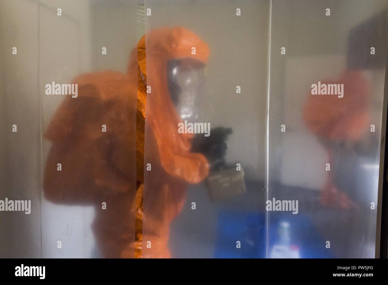 U.S. Army Survey Team member Staff Sgt. Nicky Lam, 21st Weapons of Mass ...