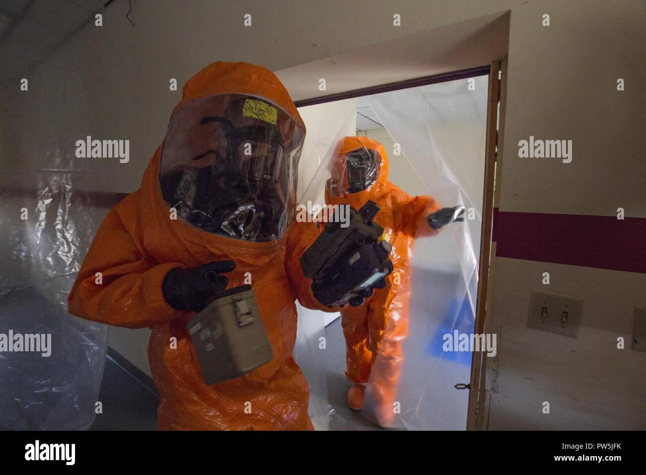 U.S. Army Survey Team member Staff Sgt. Nicky Lam, front, 21st Weapons ...