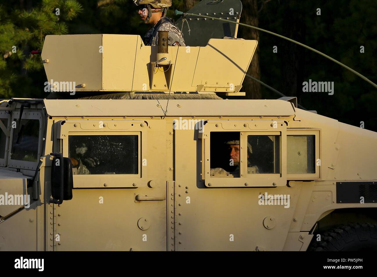 U.S. Army National Guard Soldiers head out for a key leader engagement ...