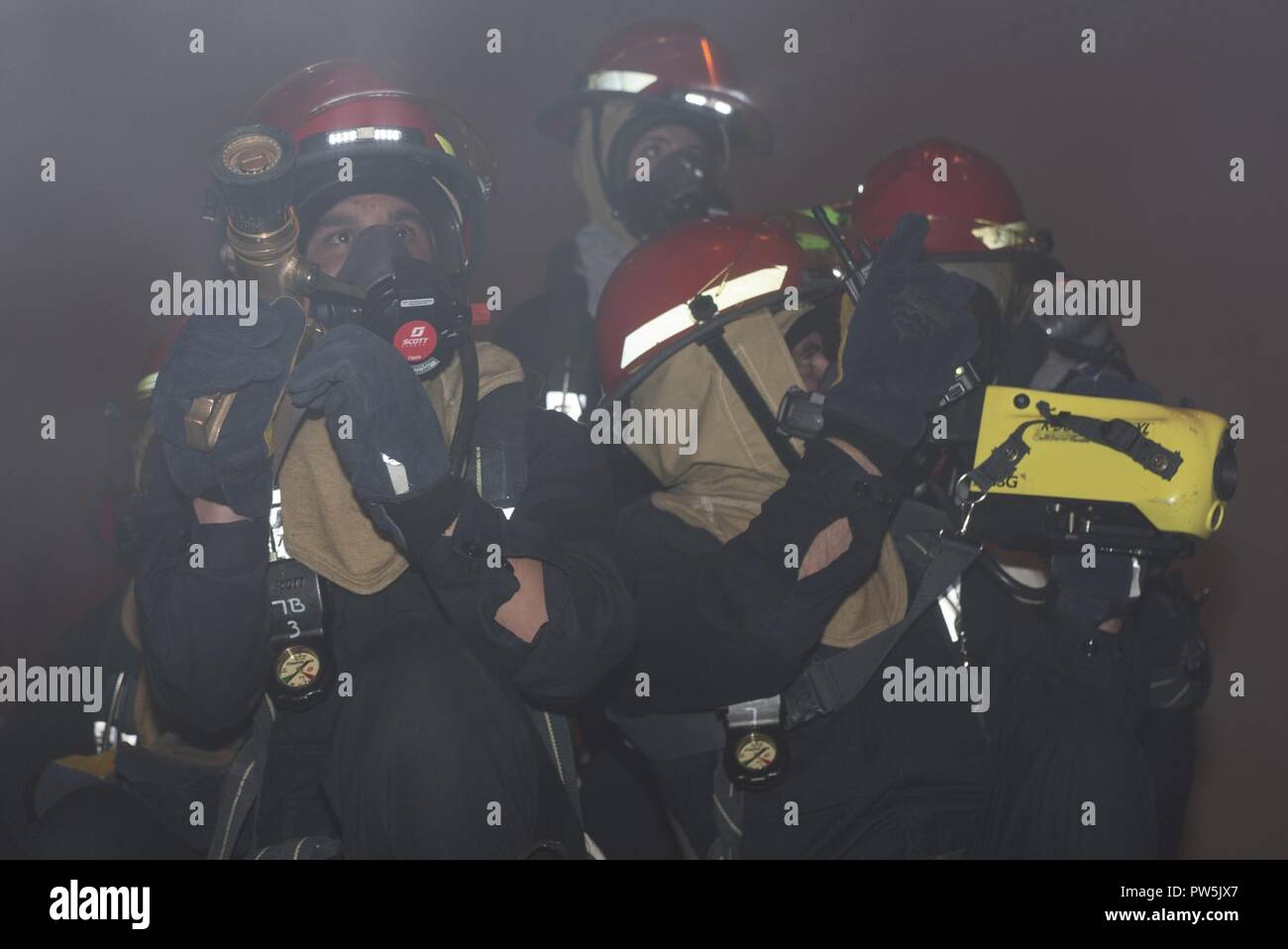 Fire hose handling techniques hi-res stock photography and images - Alamy