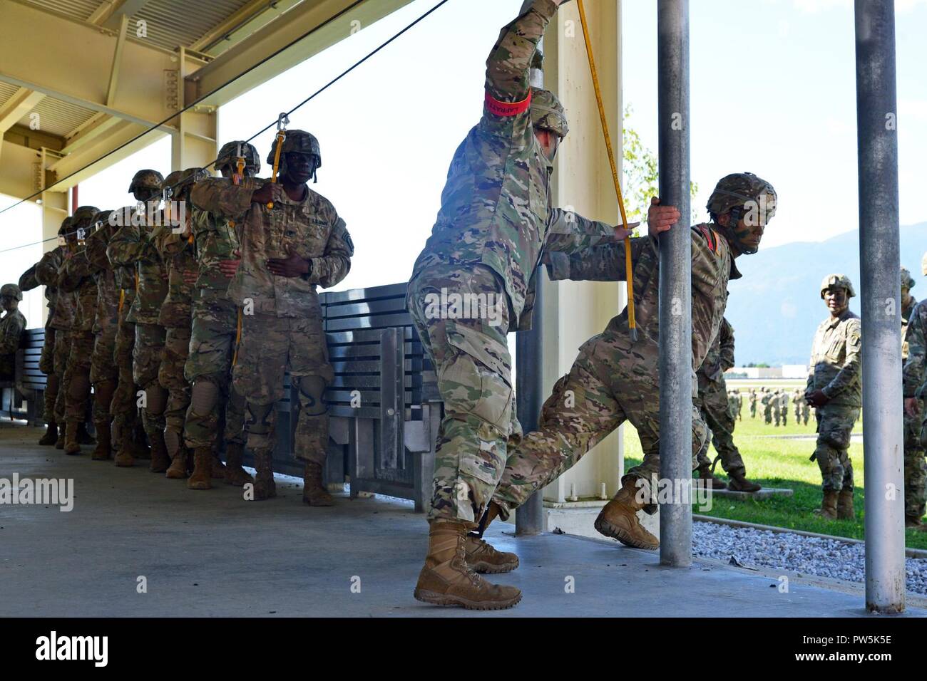 U.S. Army Lt. Col. Christopher W. Baker (center), commander of 173rd ...