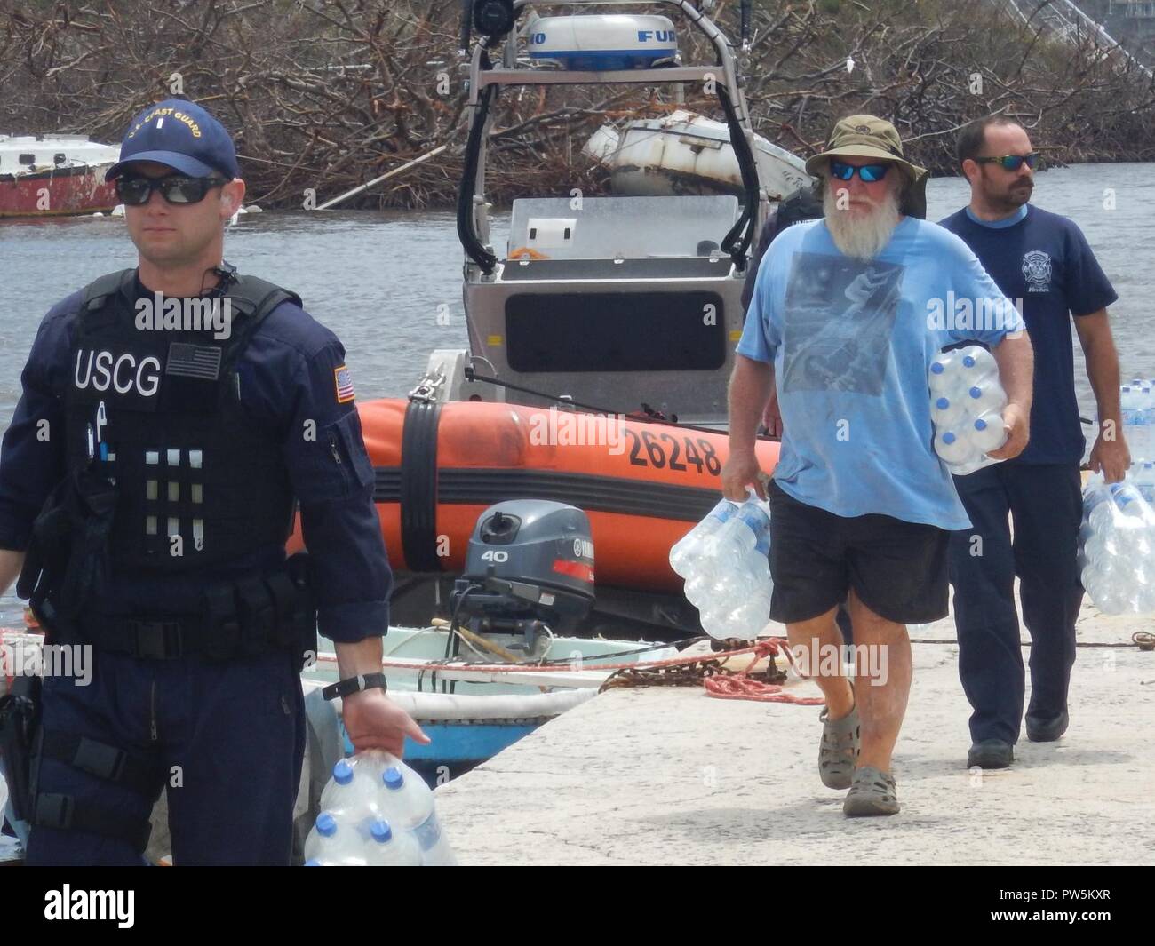 Coast Guard Cutter Joseph Napier crew offloads 450 liters of water to ...