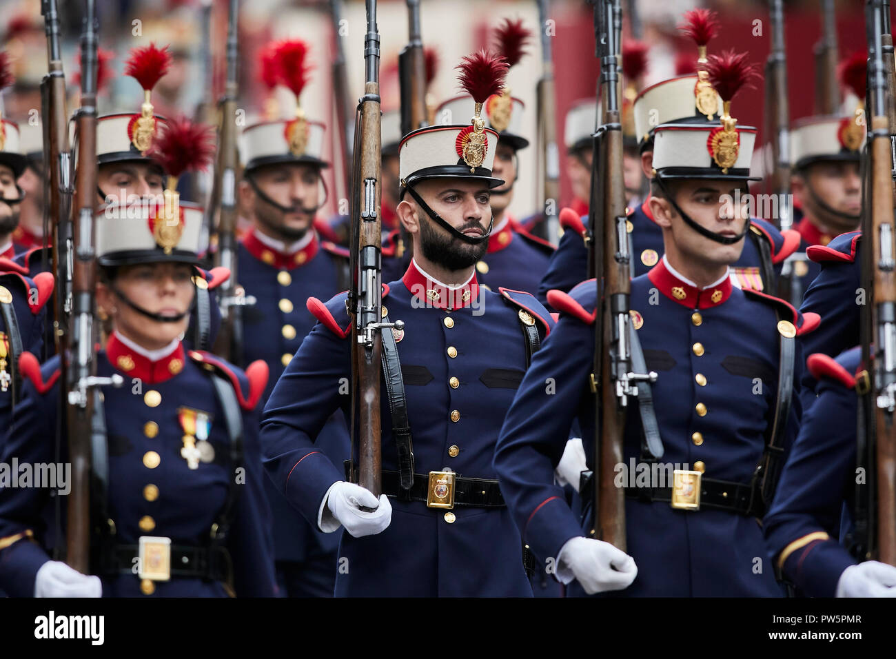 Soldiers seen marching during the Spanish National Day military parade ...