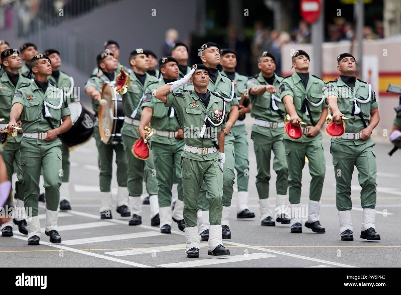 Soldiers seen marching during the Spanish National Day military parade ...