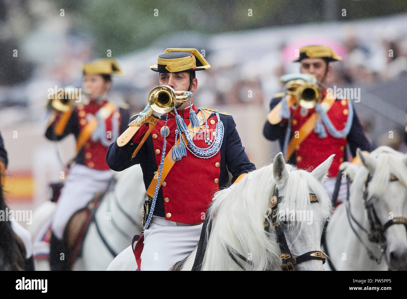 Soldiers seen riding on their horses during the Spanish National Day ...