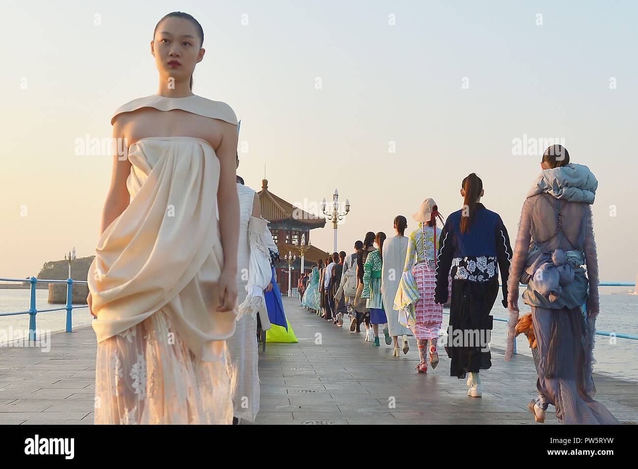Qingdao, China. 12th Oct, 2018. Forty-nine graduates majoring fashion ...
