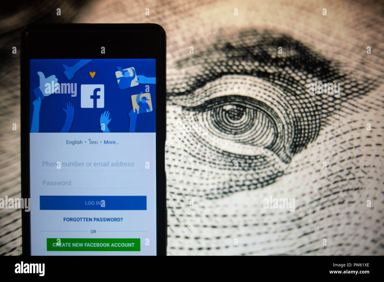 The Facebook logo seen displayed on a smartphone Stock Photo - Alamy
