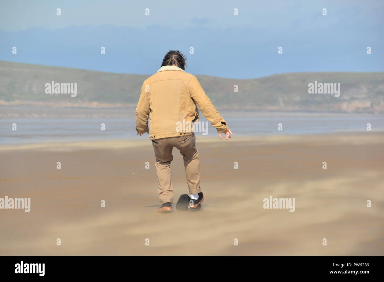 Hat blown away hi-res stock photography and images - Alamy