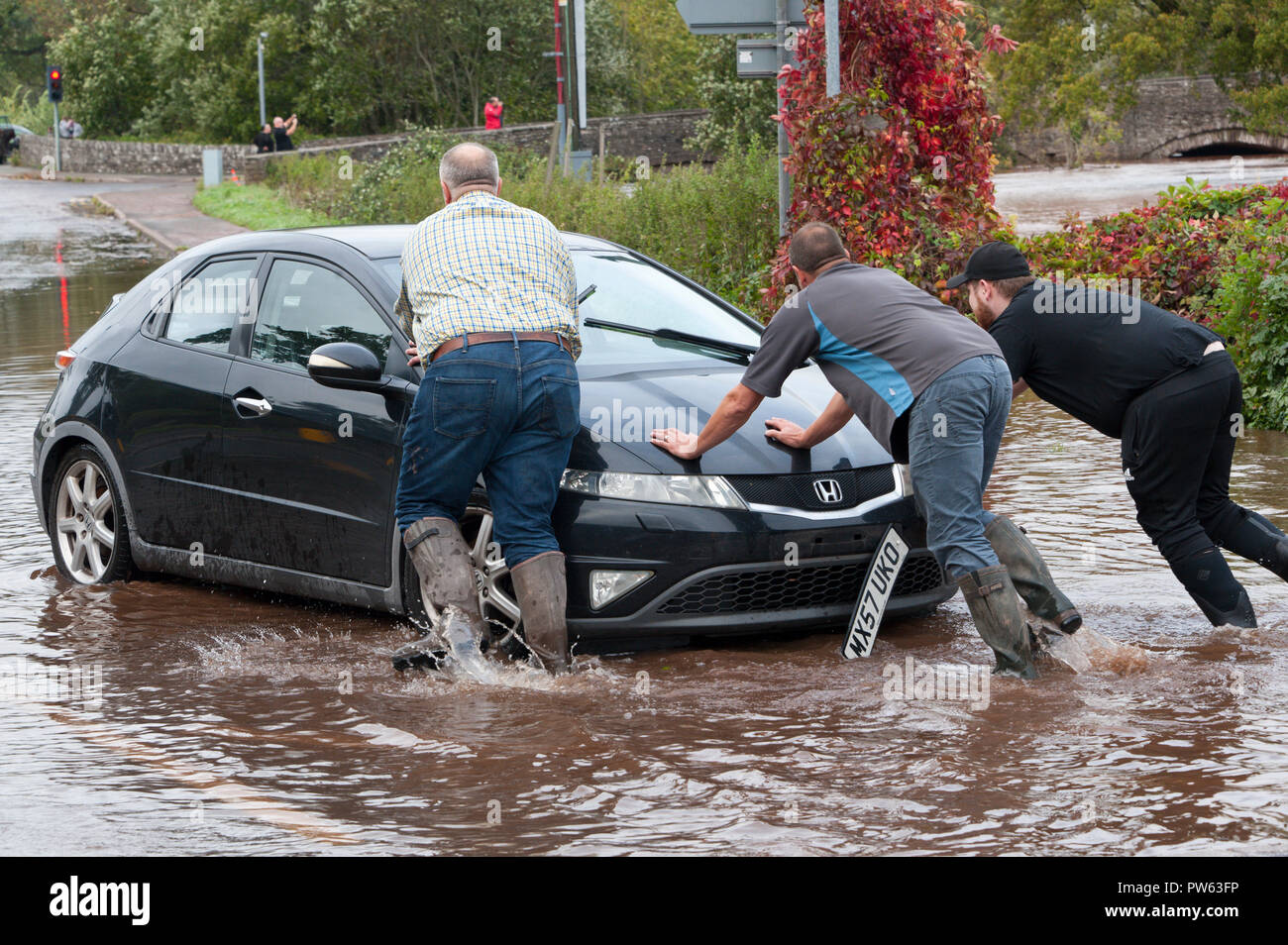 Push car in flood hi-res stock photography and images - Alamy