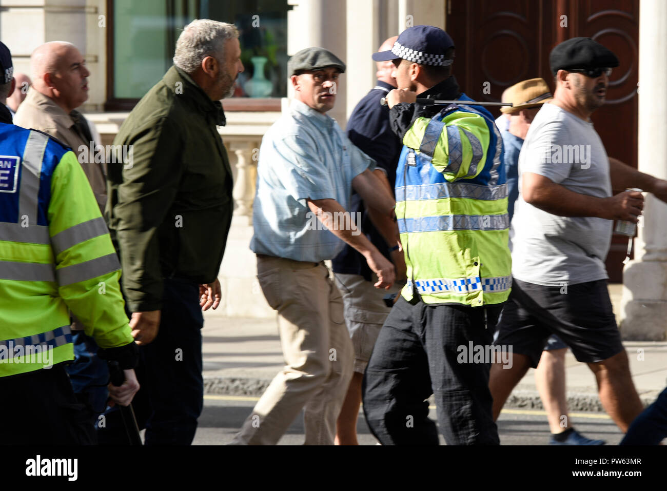 Police officers marching through london hi-res stock photography and ...