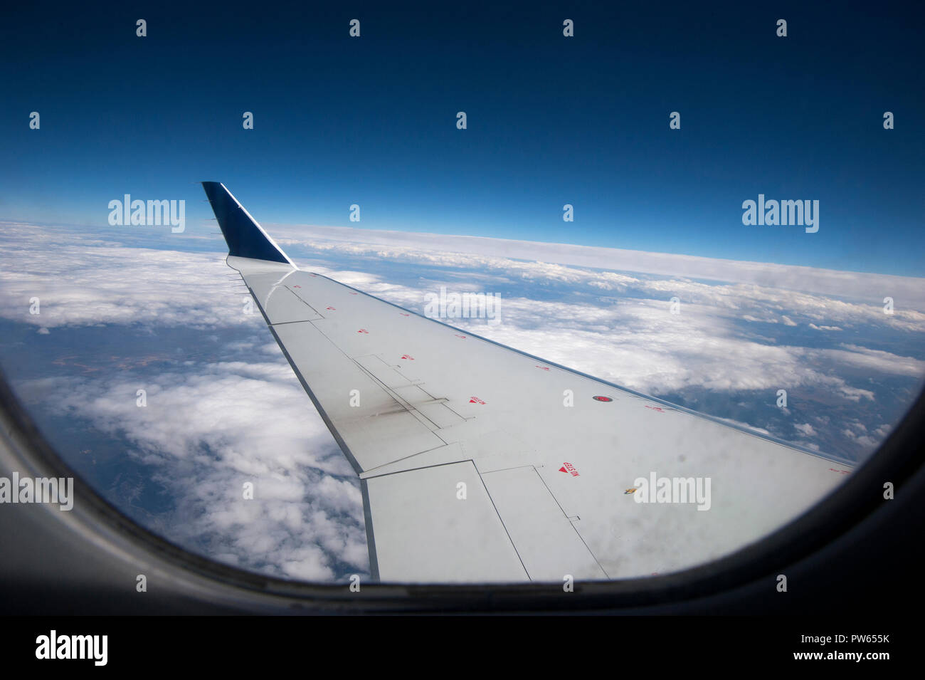 View out window of airplane in flight Stock Photo - Alamy
